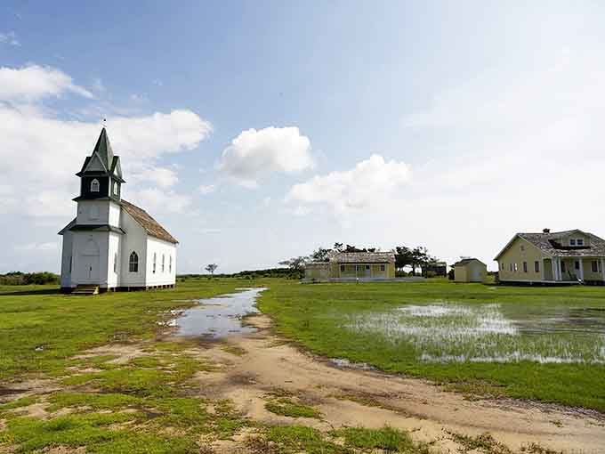 A white church, flooded path, and empty sky walk into a barrier island. No punchline needed.