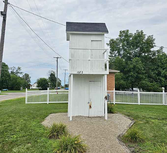 Standing tall and proud, this one-of-a-kind two-story outhouse is the most unique roadside stop in all of Illinois!