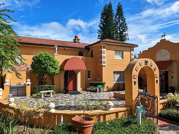 The warm yellow facade and colorful tiled courtyard of the Albin Polasek Museum make the most welcoming first impression in Winter Park!
