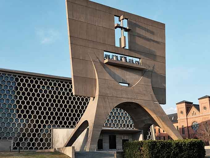 That bell banner isn't compensating for anything, it's just genuinely that confident about being 112 feet of pure concrete swagger.