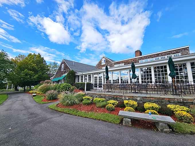 A cedar shake beauty sitting pretty under Long Island skies, like history decided to stick around for dinner.