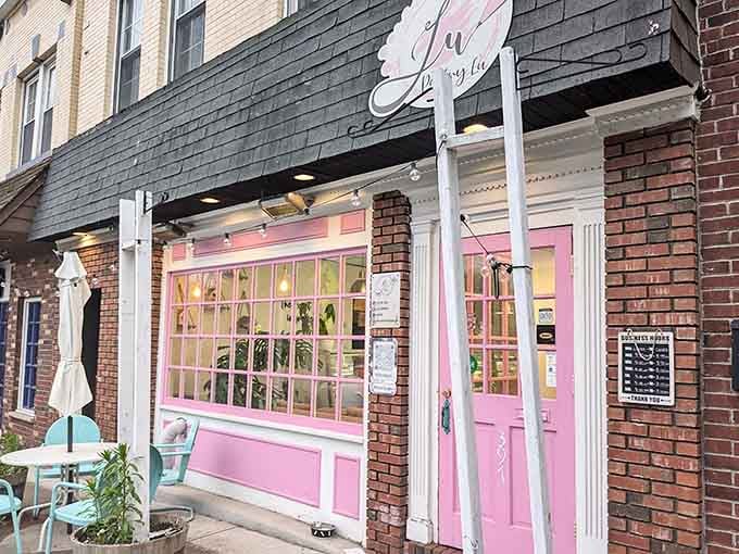 That pink storefront isn't whispering, it's announcing that something special lives here on Main Street.