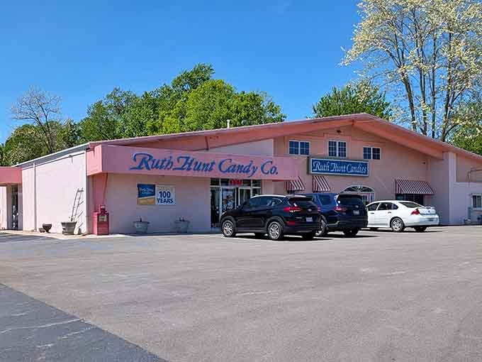 That cheerful pink building isn't just a candy store, it's a Kentucky landmark that's earned every stripe on those awnings.