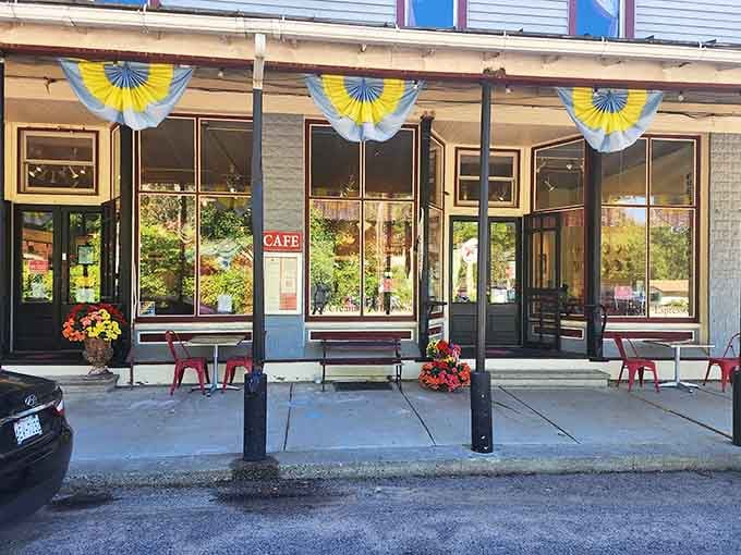 This charming storefront practically whispers "come in for pie" with those cheerful blue and yellow decorations beckoning visitors inside.