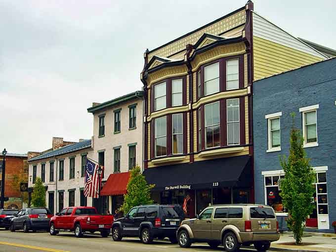 Historic Main Street magic, where Victorian brickwork and American flags remind you that some things are worth preserving forever.