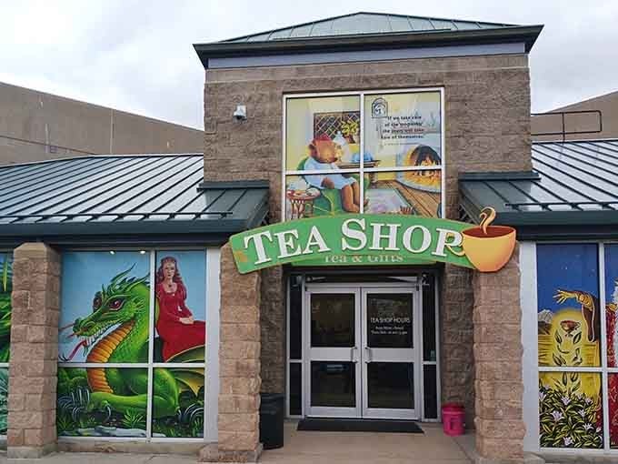 The tea shop exterior bursts with vibrant murals, practically shouting, "Adventure lives inside, come on in."