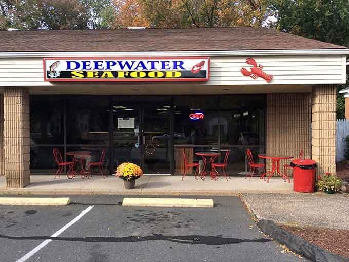 That cheerful lobster on the sign knows something you don't: the freshest seafood in landlocked Connecticut awaits inside.