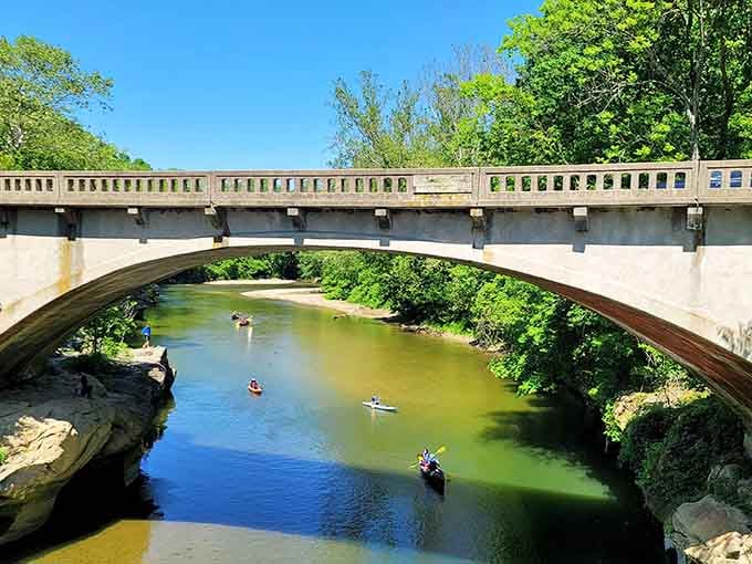 Kayaks, canoes, paddleboards, and pure joy, Sugar Creek under that stone arch is Indiana's best Sunday afternoon.