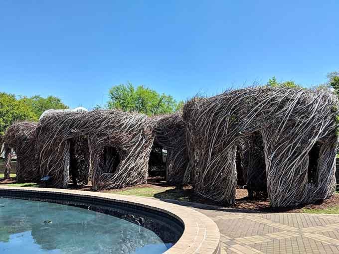 These woven stick structures look like something from a fairy tale, proving that art doesn't always need bronze.