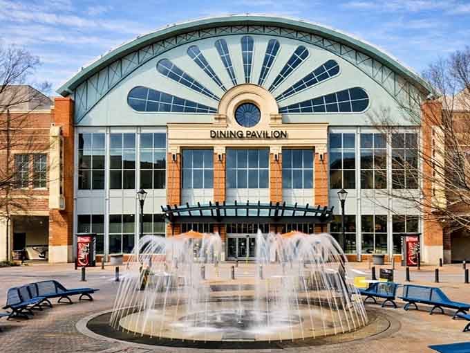 That distinctive arched building isn't just an entrance—it's your gateway to a full-day retail adventure in Buford.