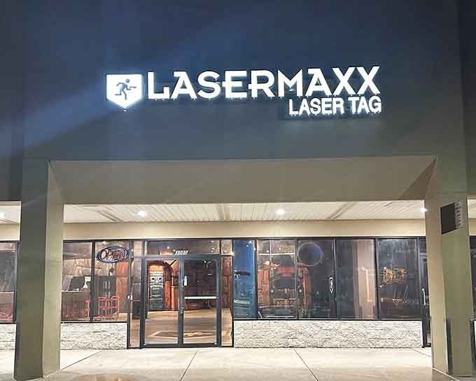 That glowing sign cutting through the night sky is basically Newington, Connecticut's way of saying, "Adventure is open for business."