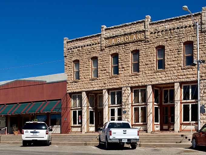 These storefronts have witnessed more Texas history than most textbooks, standing proud like architectural time capsules.