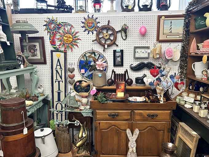 A ship's wheel, a sun medallion, and a ceramic rabbit walk into an antiques booth. Sounds like a great Saturday.