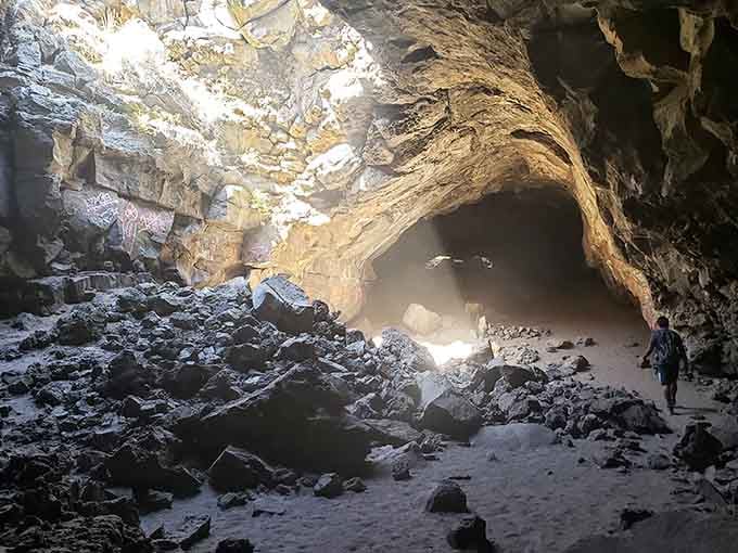 The entrance to Pluto's Cave looks like nature's own secret doorway to another world beneath your feet.