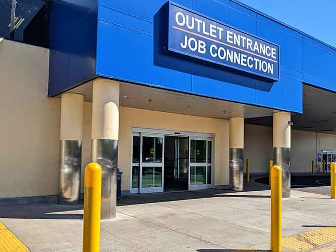 Bright yellow bollards, automatic doors, and somewhere beyond them, your next great thrift store discovery awaits.