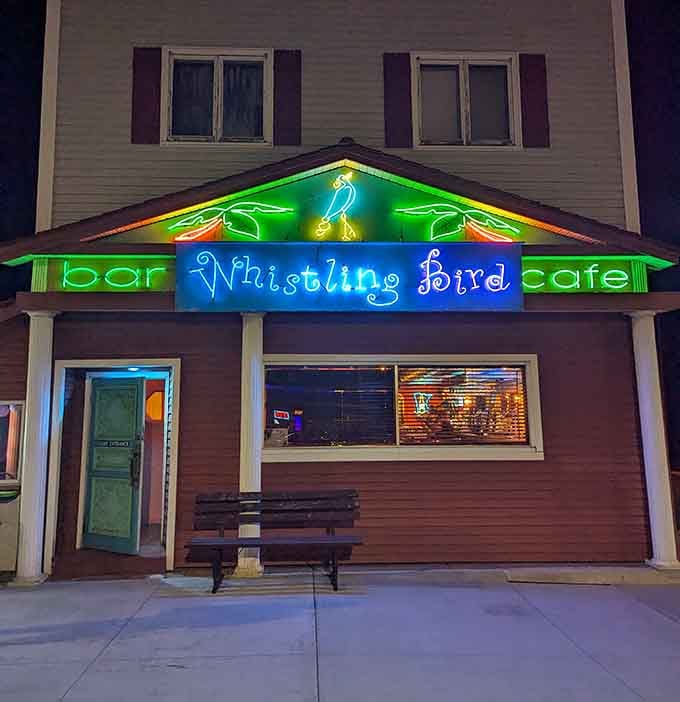 A bright green door and a tiki sign in Minnesota? Yes, this is absolutely real life.