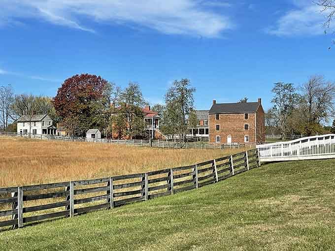 Autumn gold blankets these Virginia fields, where split-rail fences frame buildings that witnessed the end of a nation's greatest conflict.