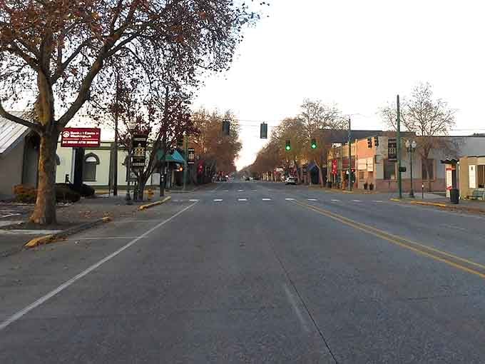 Main Street Dayton at golden hour, where the biggest traffic jam is a tractor and nobody minds.
