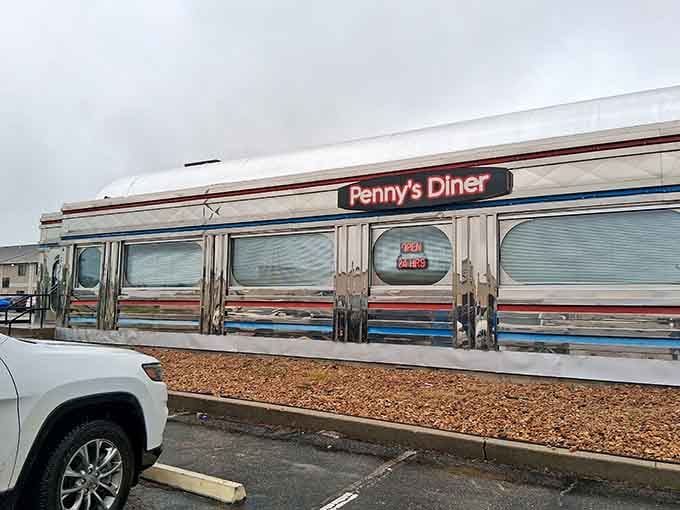 That glowing "Open 24 Hrs" sign is basically a beacon of hope for hungry travelers everywhere.
