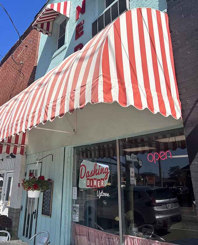 That red-and-white striped awning is basically a neon sign saying, "Your morning just got better, friend."