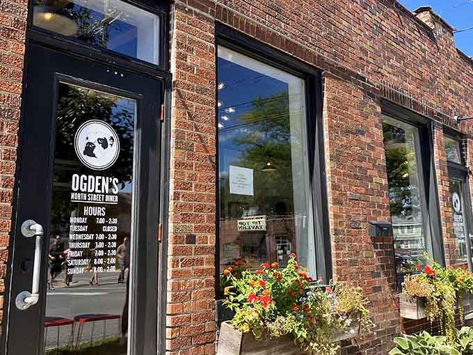 That charming brick facade isn't just pretty, it's practically waving you inside for breakfast bliss.