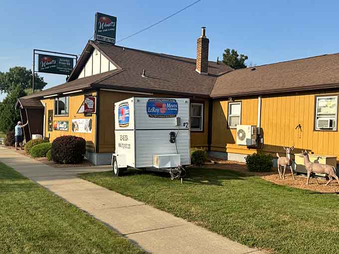 A warm yellow building on Lake Winnebago's shore, quietly promising the best fish fry of your life.