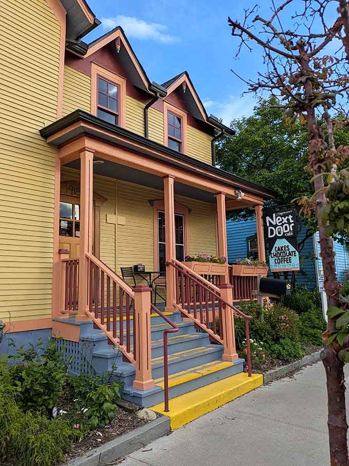 That yellow Victorian exterior isn't just charming, it's practically begging you to come inside for pastries.