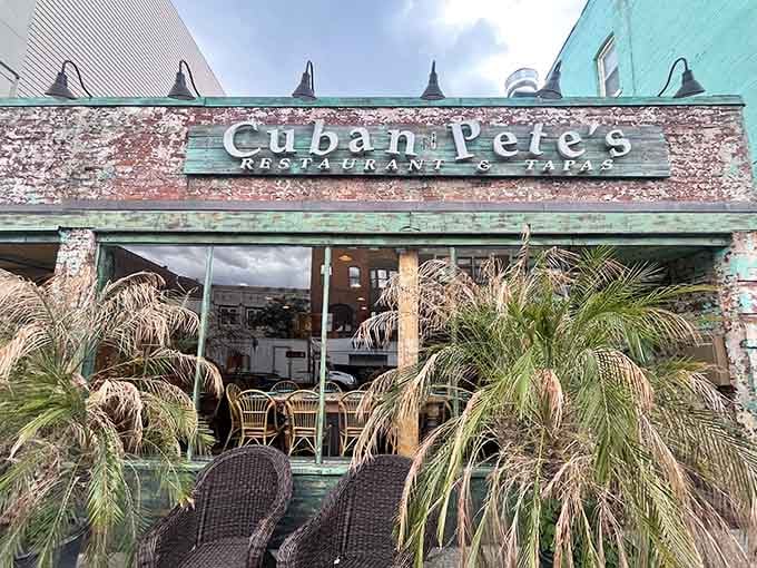 That weathered turquoise facade isn't Instagram bait, it's the real deal welcoming you to Cuban paradise.