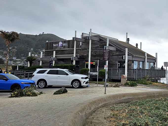 Yes, that's a real Taco Bell sign, and yes, that's a real ocean behind it.