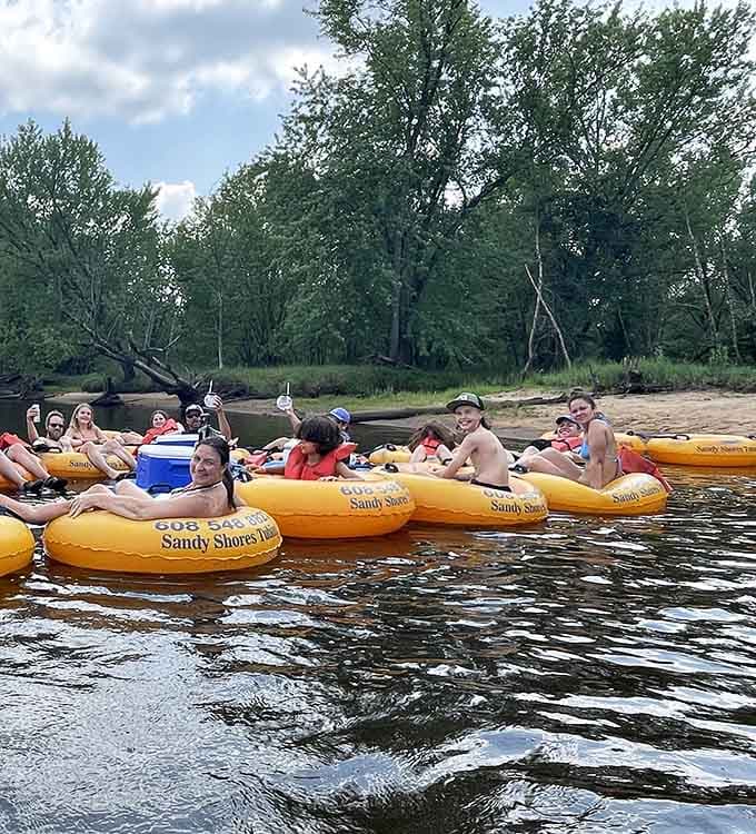 Pure joy on the water. These tubes prove that orange is absolutely the color of summer happiness.