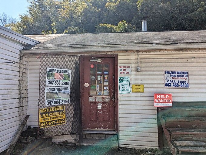 Don't let the flyers fool you, behind this humble door lives some of the most serious BBQ in Maryland.