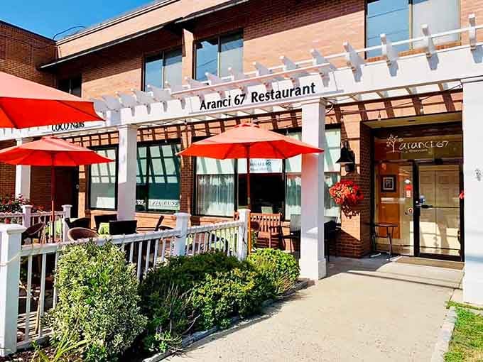 Those red umbrellas and that white pergola are basically Connecticut's way of saying, "Italy called, and we answered."