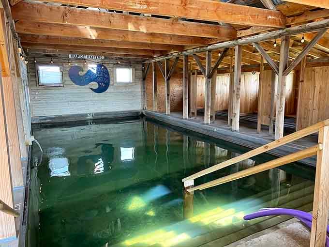 The indoor bathhouse at Summer Lake Hot Springs, where mineral-rich water meets rustic charm in perfect harmony.