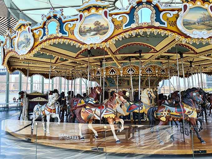 A century of craftsmanship spinning in place, this carousel canopy is pure gold-trimmed, hand-painted perfection.