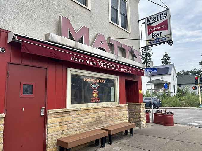 That red awning and stone facade on Cedar Avenue is basically a neon sign saying "your lunch plans just got better."