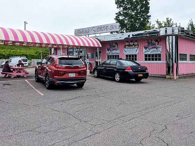 That pink-and-white striped awning isn't just decoration; it's a beacon calling you home to comfort food paradise.