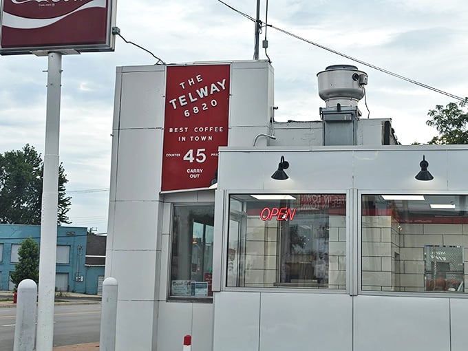 That glowing "OPEN" sign at Telway Hamburgers is basically Detroit's version of a Bat-Signal for hungry people.