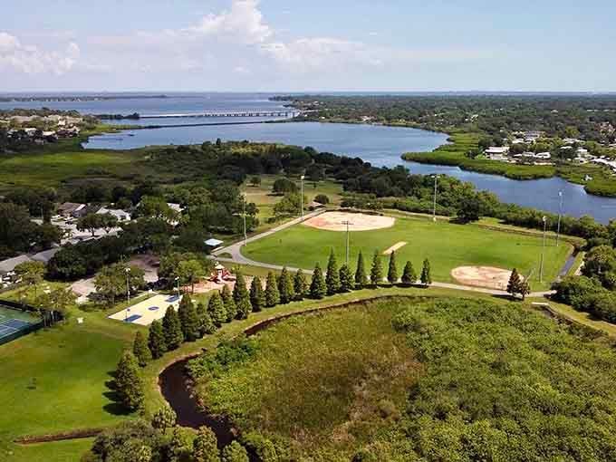 Tree-lined neighborhoods meeting Tampa Bay waters: this is what Florida living looks like when done right.