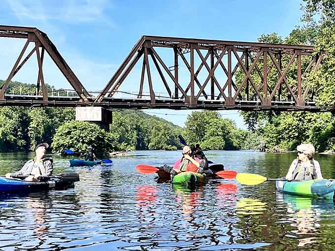 Paddling under historic bridges in colorful kayaks beats scrolling through social media any day of the week.