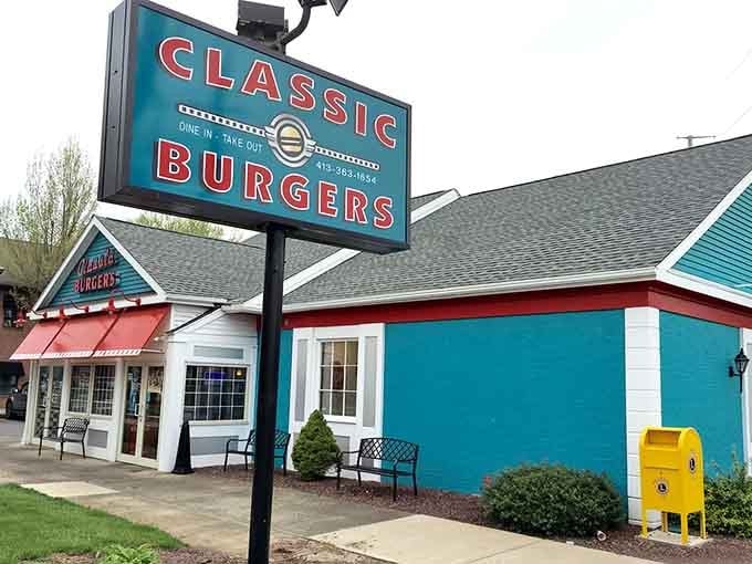 That teal and red exterior isn't subtle, and honestly, thank goodness for that. Classic Burgers means business.