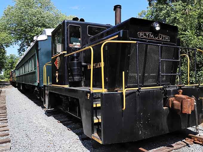 That bold black Plymouth locomotive with yellow trim isn't just a pretty face, it's Maryland history ready to roll.