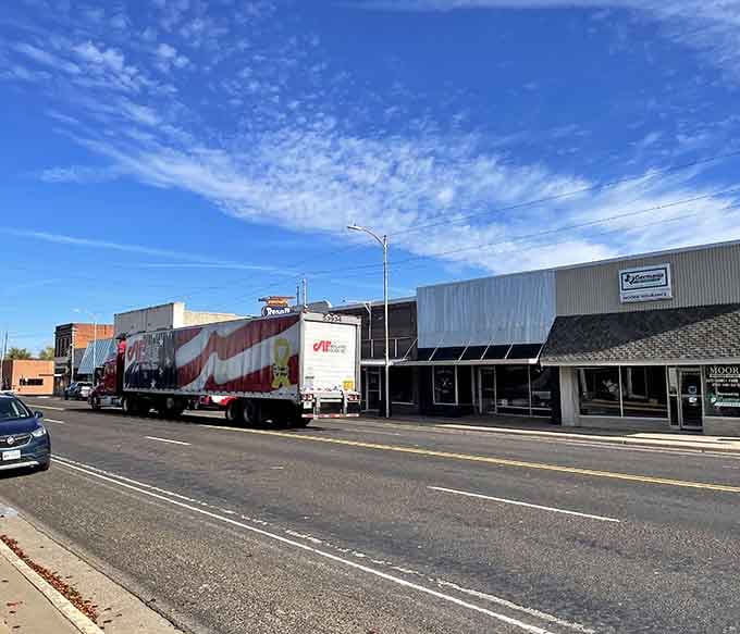 A patriotic big rig rolls through Shamrock's main drag like it owns the whole Panhandle, and honestly, fair enough.