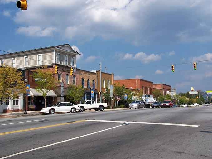 The kind of main street that makes you slow down, park the car, and actually look at where you've landed.