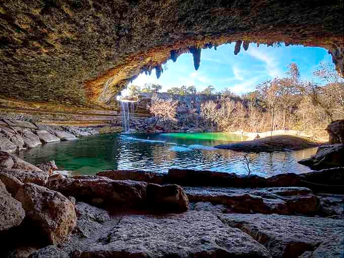 Looking out from inside the grotto like you're peeking through nature's own picture frame at paradise.