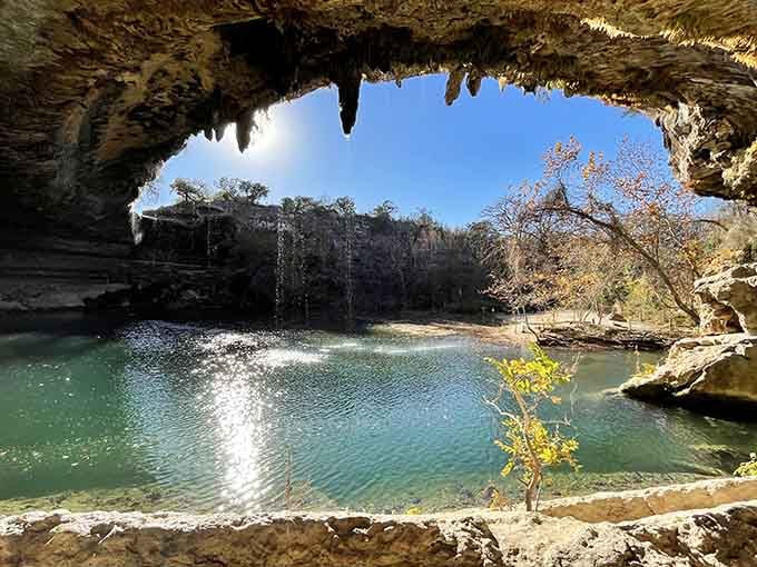 When a cave's ceiling gives up and creates accidental paradise, complete with that waterfall money shot.
