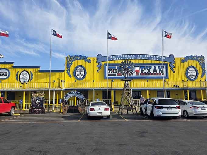 That bold yellow exterior isn't shy, and neither is the 72-ounce steak waiting inside.