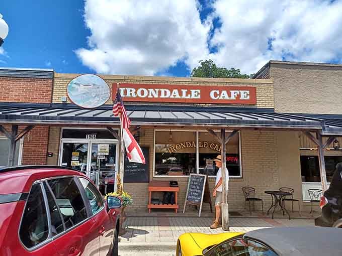 That bold red sign and the Alabama flag flying proud say everything you need to know before you even walk in.