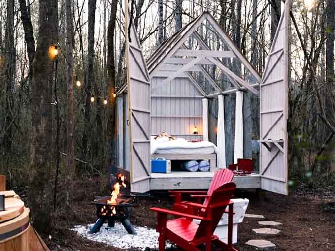 String lights, a crackling fire, and a bed waiting in the woods. Georgia just won glamping.