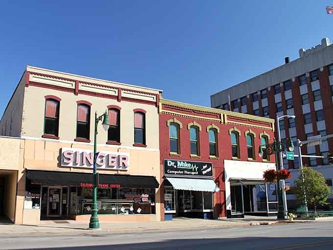 Historic storefronts standing proud on a sunny corner, where small-town character outlasts every passing trend.