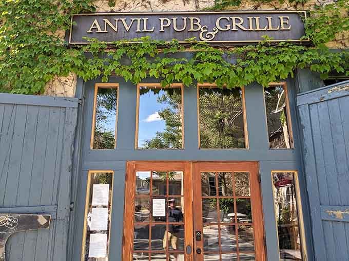 Ivy-draped limestone walls and warm wooden doors &mdash; the Anvil Pub & Grille's exterior practically whispers, "Come on in, you've earned this."